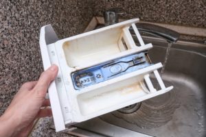 How to Clean a Washing Machine Drawer with Vinegar