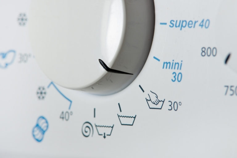 How to Save Money Doing Laundry (6 Easy Ways)